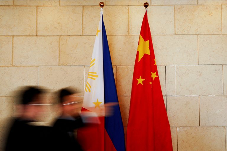 Philippines urges China to keep tone 'calm' as rhetoric heats up